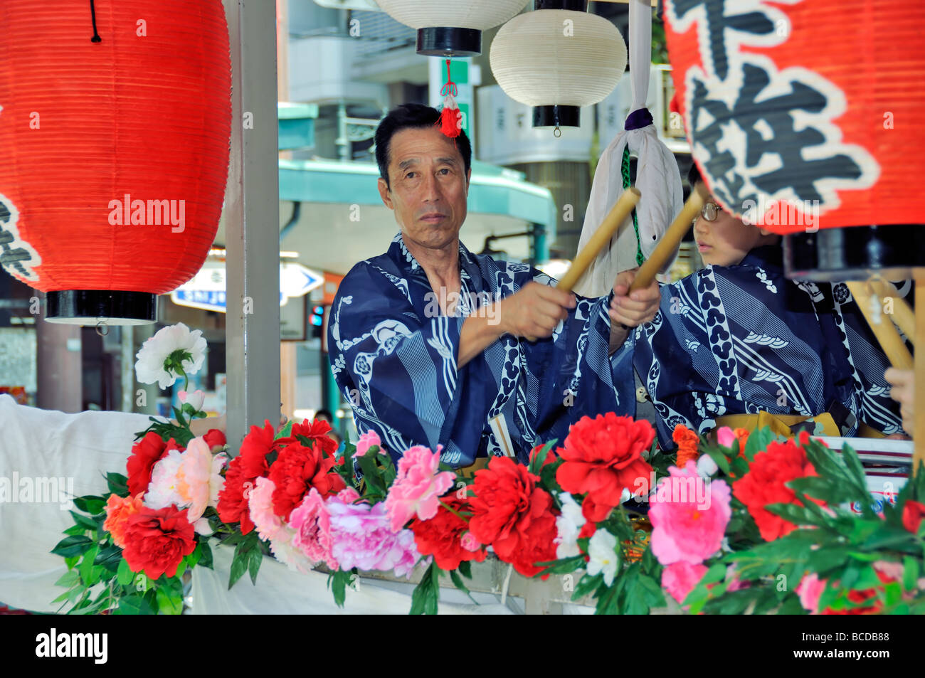 Man beating a drum hi-res stock photography and images - Alamy