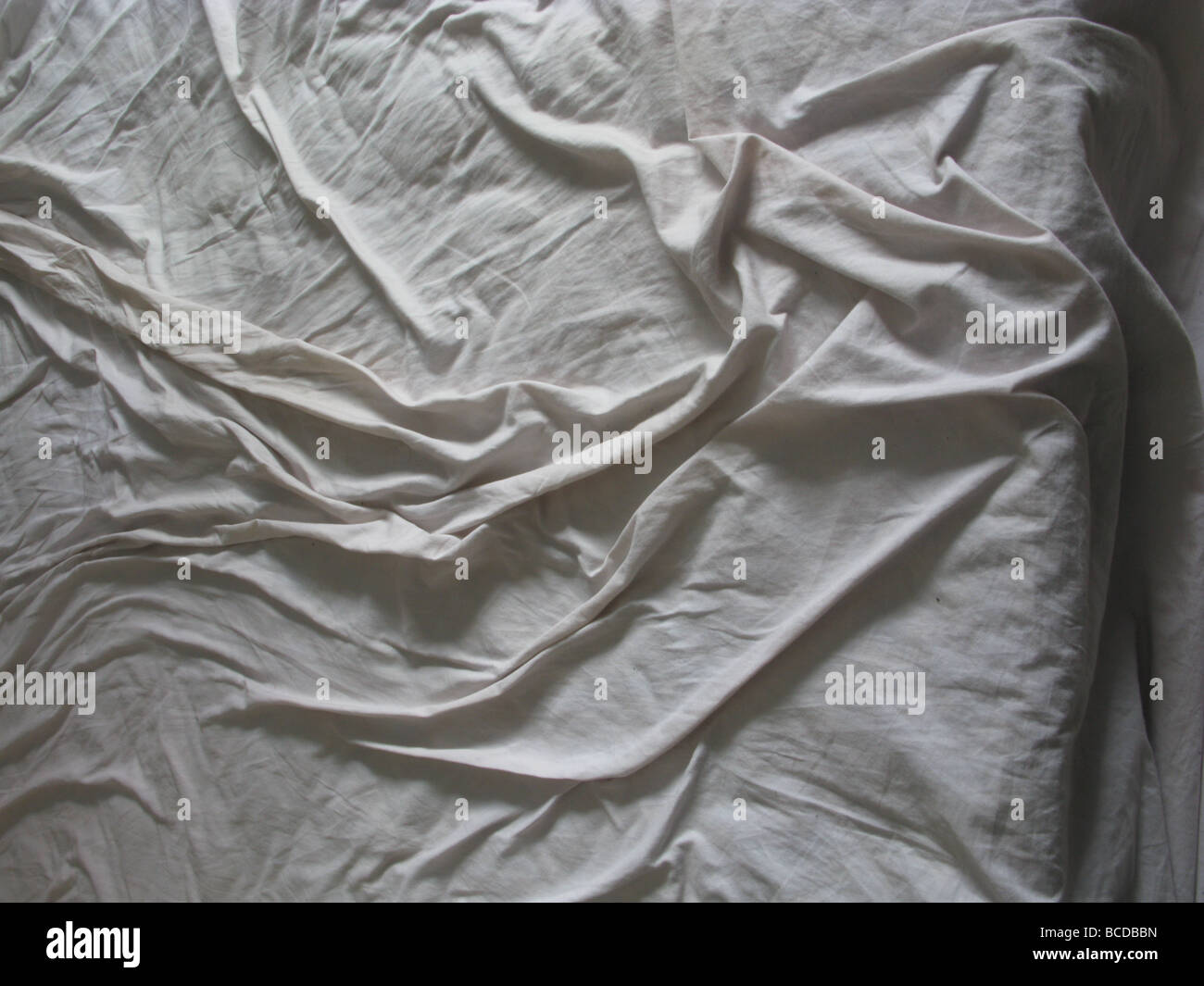 creases on bed sheet in dark room Stock Photo - Alamy