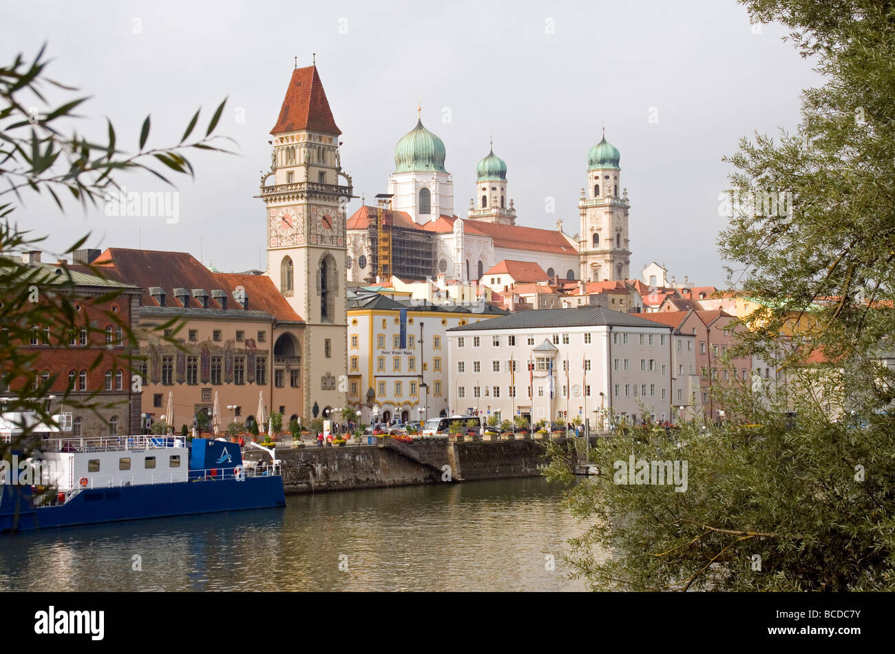 Danube (Donau) River water front in Passau with Town Hall clock tower ...