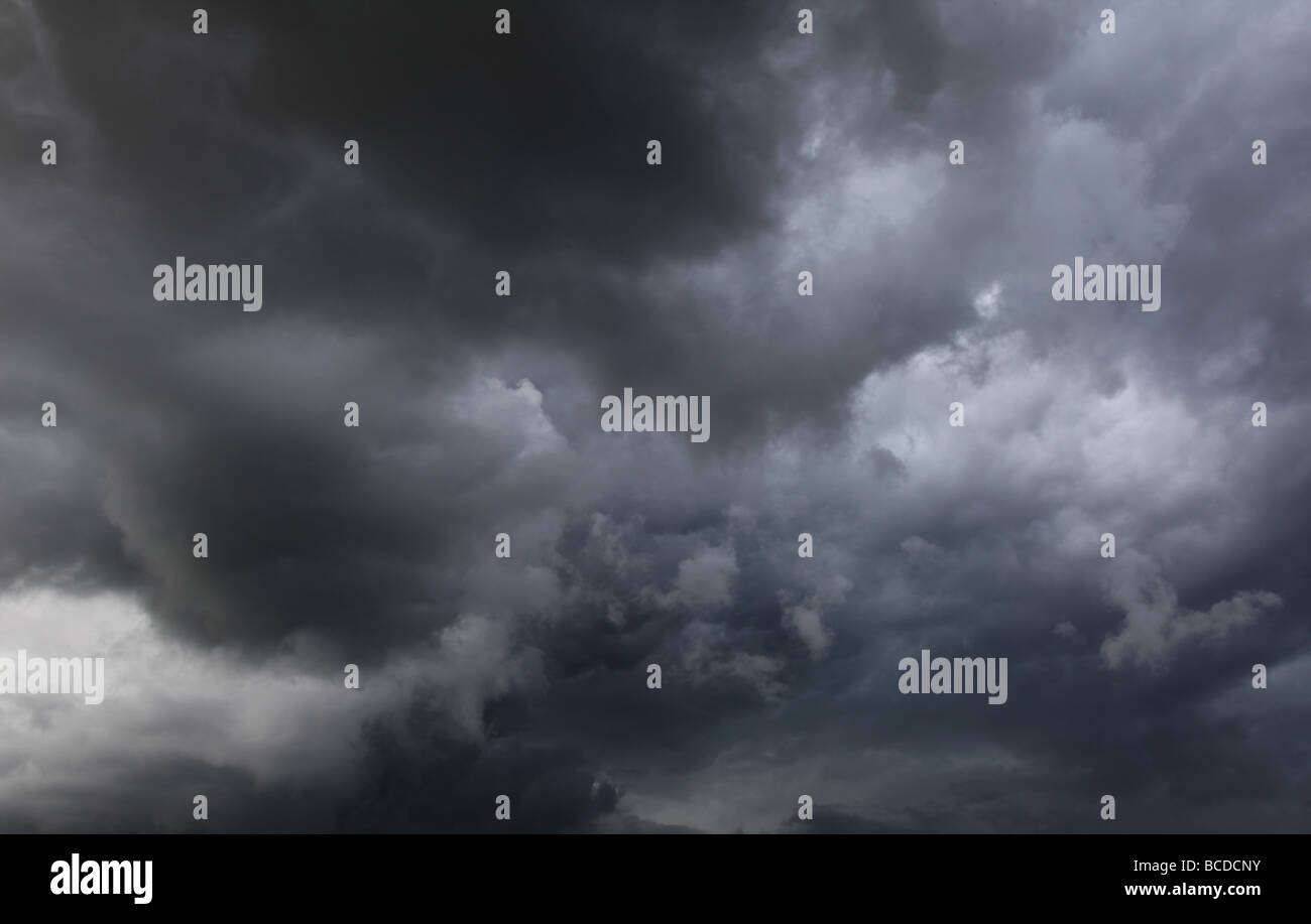 stormy, threatening sky developing thunder clouds, ideal background image Stock Photo - Alamy