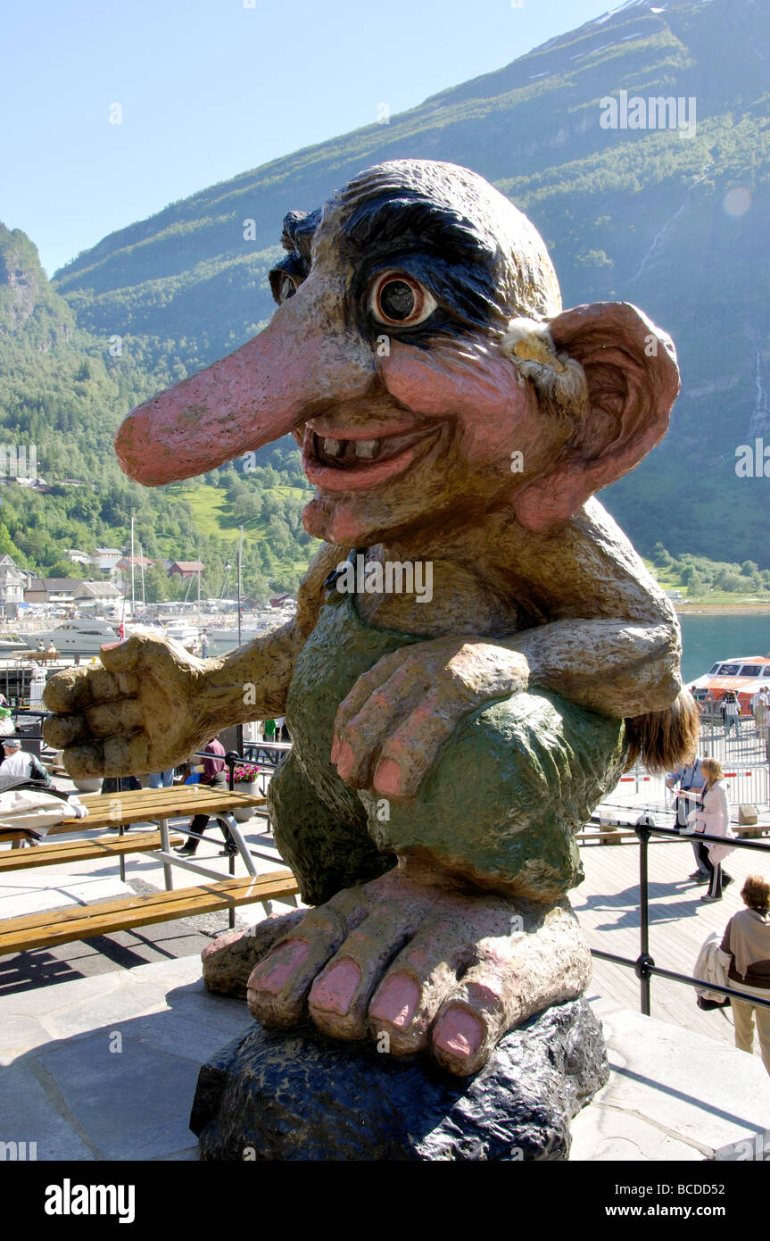 Wooden troll (Nordic folklore) outside shop, Geiranger, Geiranger Fjord ...