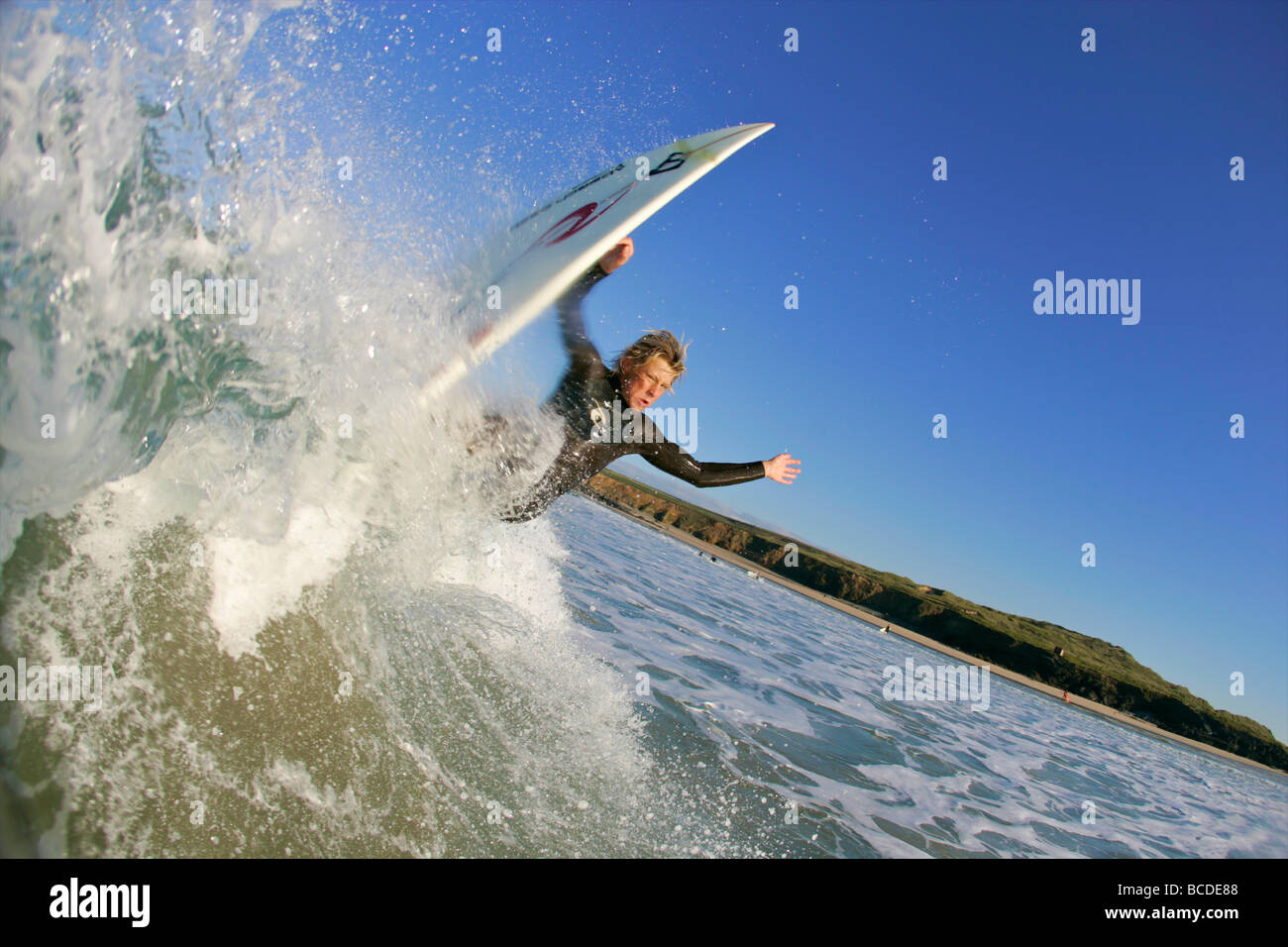 British surfer Jayce Robinson surfing at his local surf break in ...