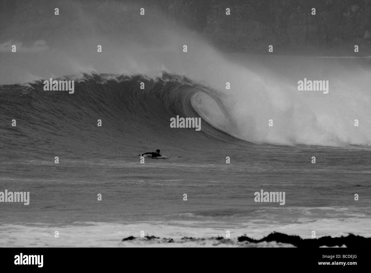 A wave breaks onto the reef at Porthleven in Cornwall Stock Photo - Alamy