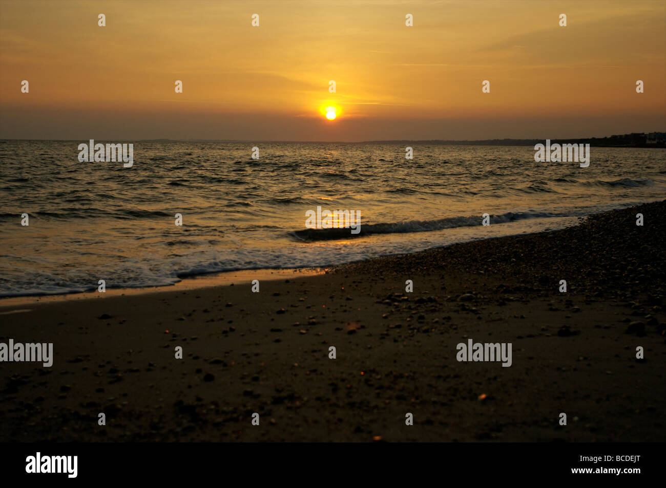 Sunset over Key Haven beach in Hampshire Stock Photo - Alamy