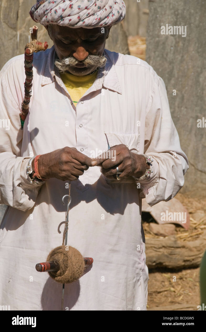 Man weaving string from camel hair hi-res stock photography and images ...