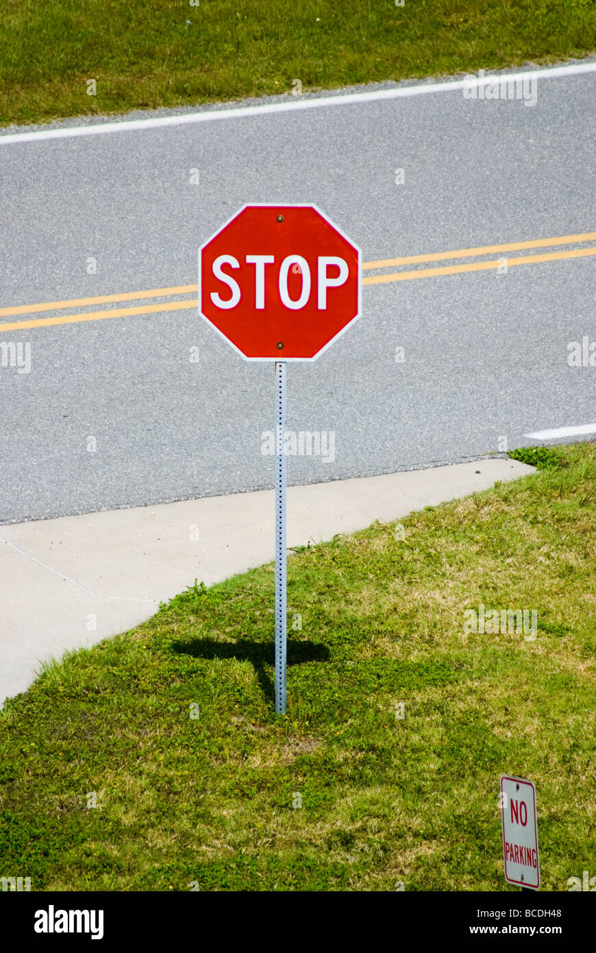 American stop sign at junction with highway Stock Photo - Alamy