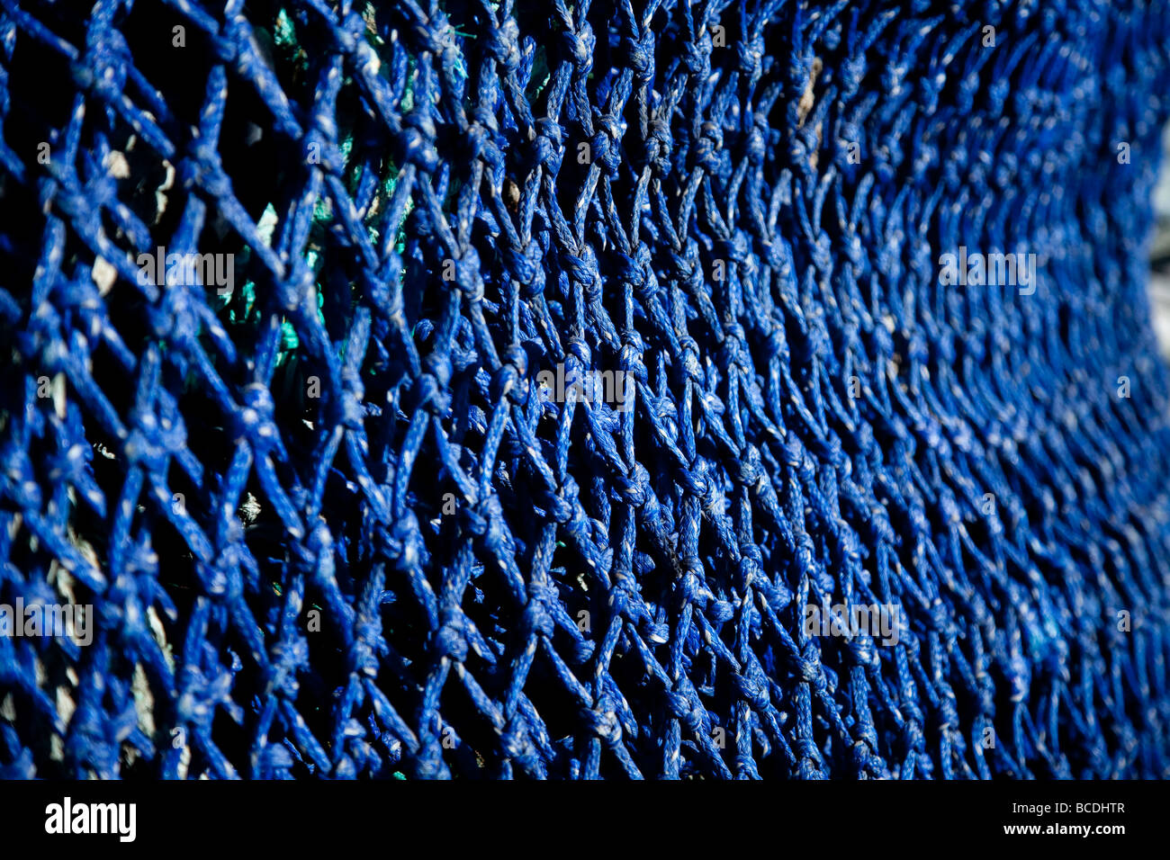 Blue fishing net Stock Photo - Alamy