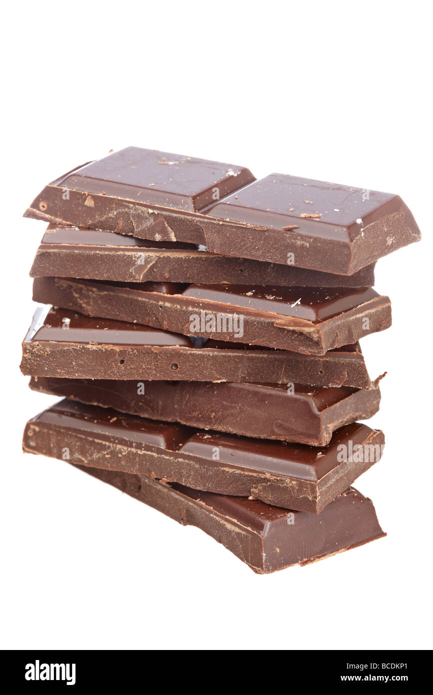 Blocks of chocolate isolated on white background Shallow depth of field ...