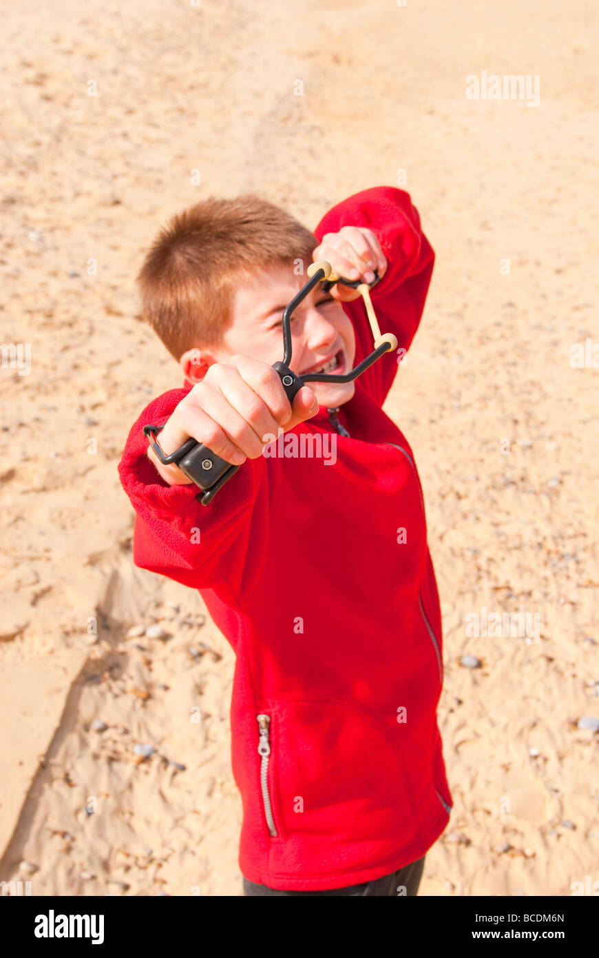 Boy with catapult hi-res stock photography and images - Alamy