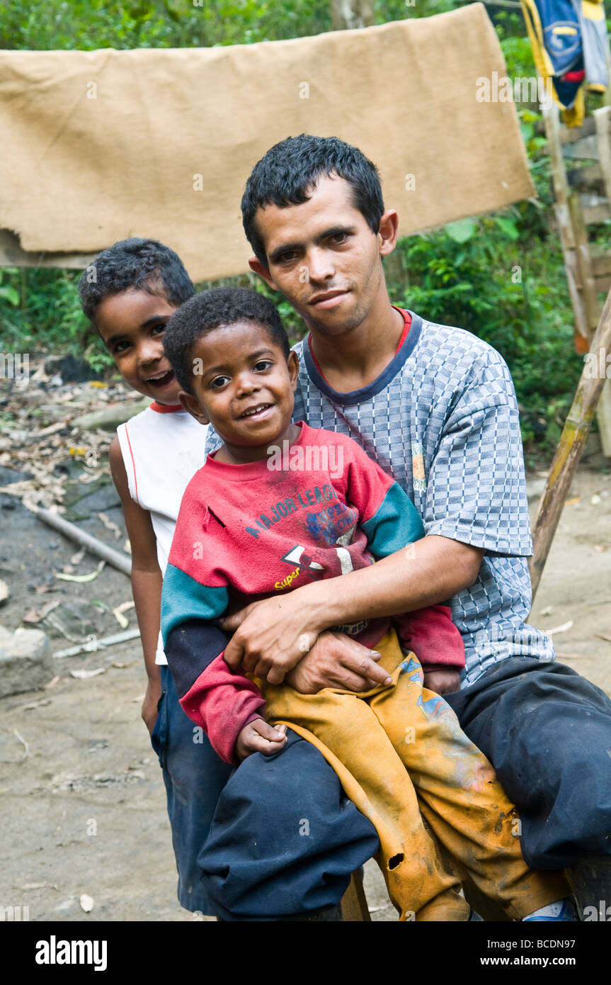 Children with their daddy in a very poor slum outside Sao Paulo, Brazil ...