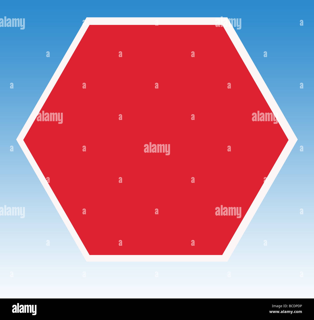 Blank hexagonal red road traffic warning sign isolated on blue sky ...