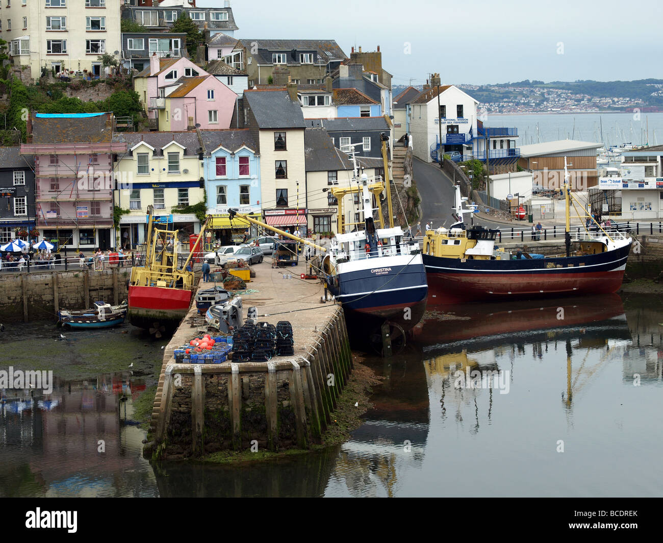The main quay/pier in the harbour at Brixham,Devon Stock Photo - Alamy