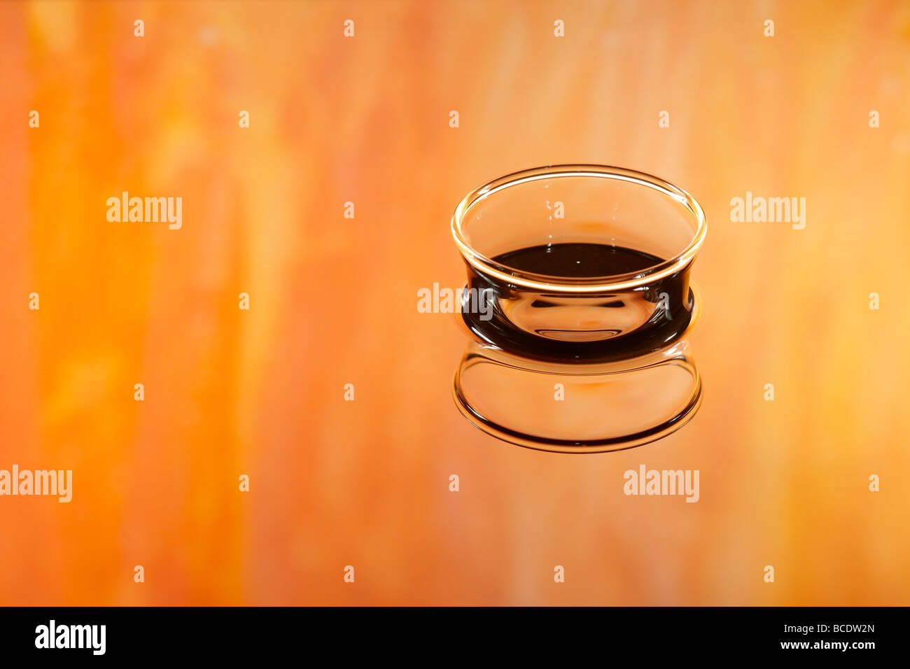 Oil splash caused by falling oil droplet Stock Photo - Alamy
