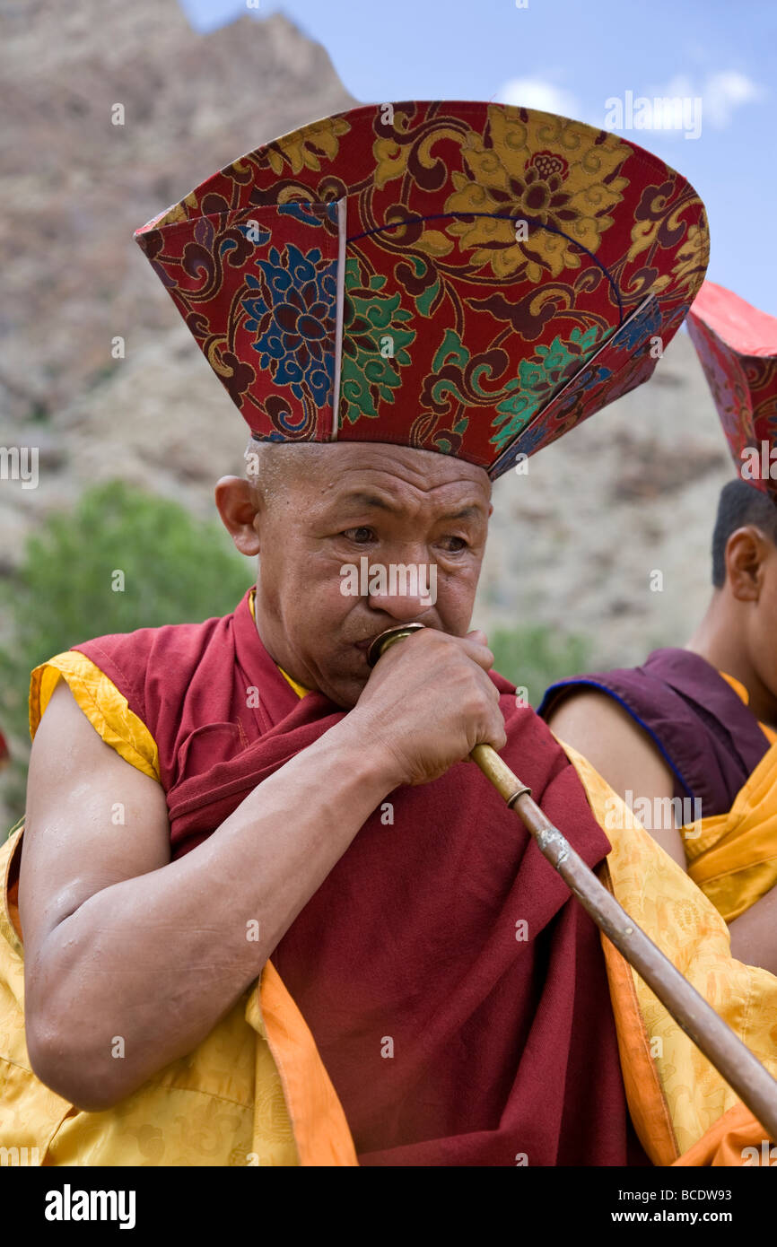 Buddhist monk blowing the tibetan horn. Hemis Gompa festival. Ladakh ...