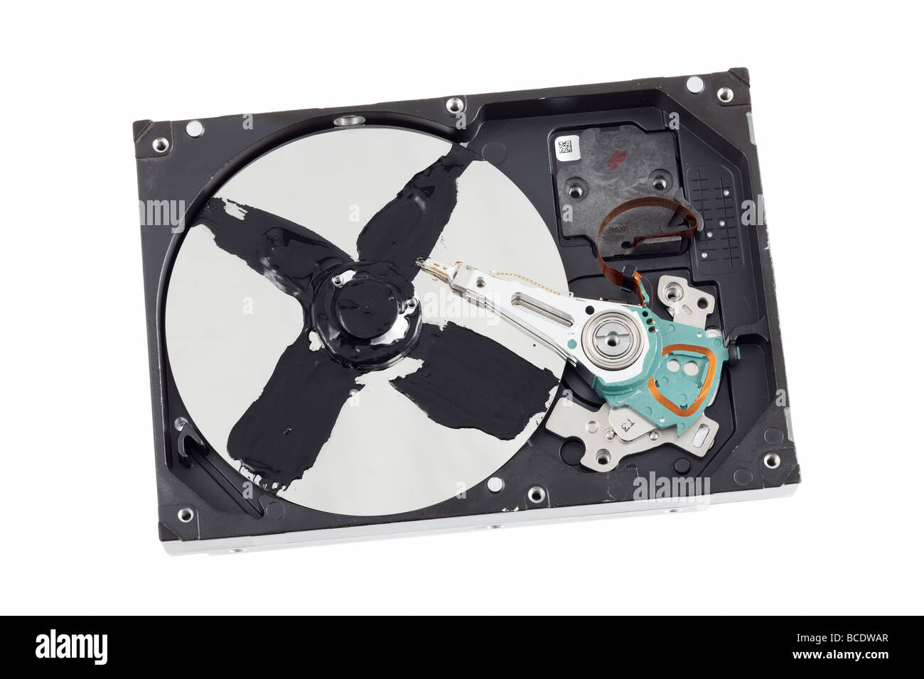 Computer hard disk without cover cross marked with black paint to ...