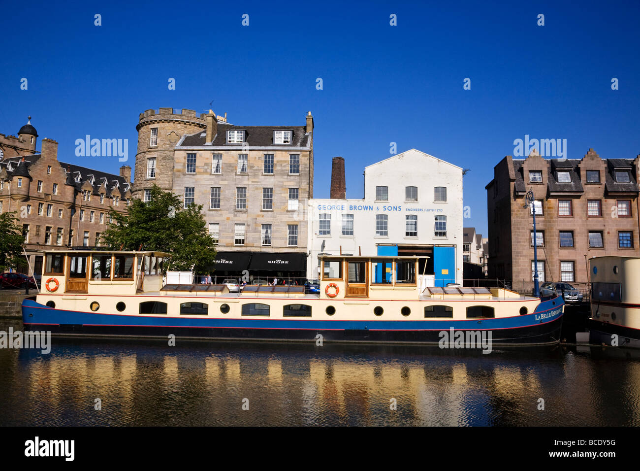 A barge moored at the riverside, The Shore, Leith, Edinburgh, Scotland ...