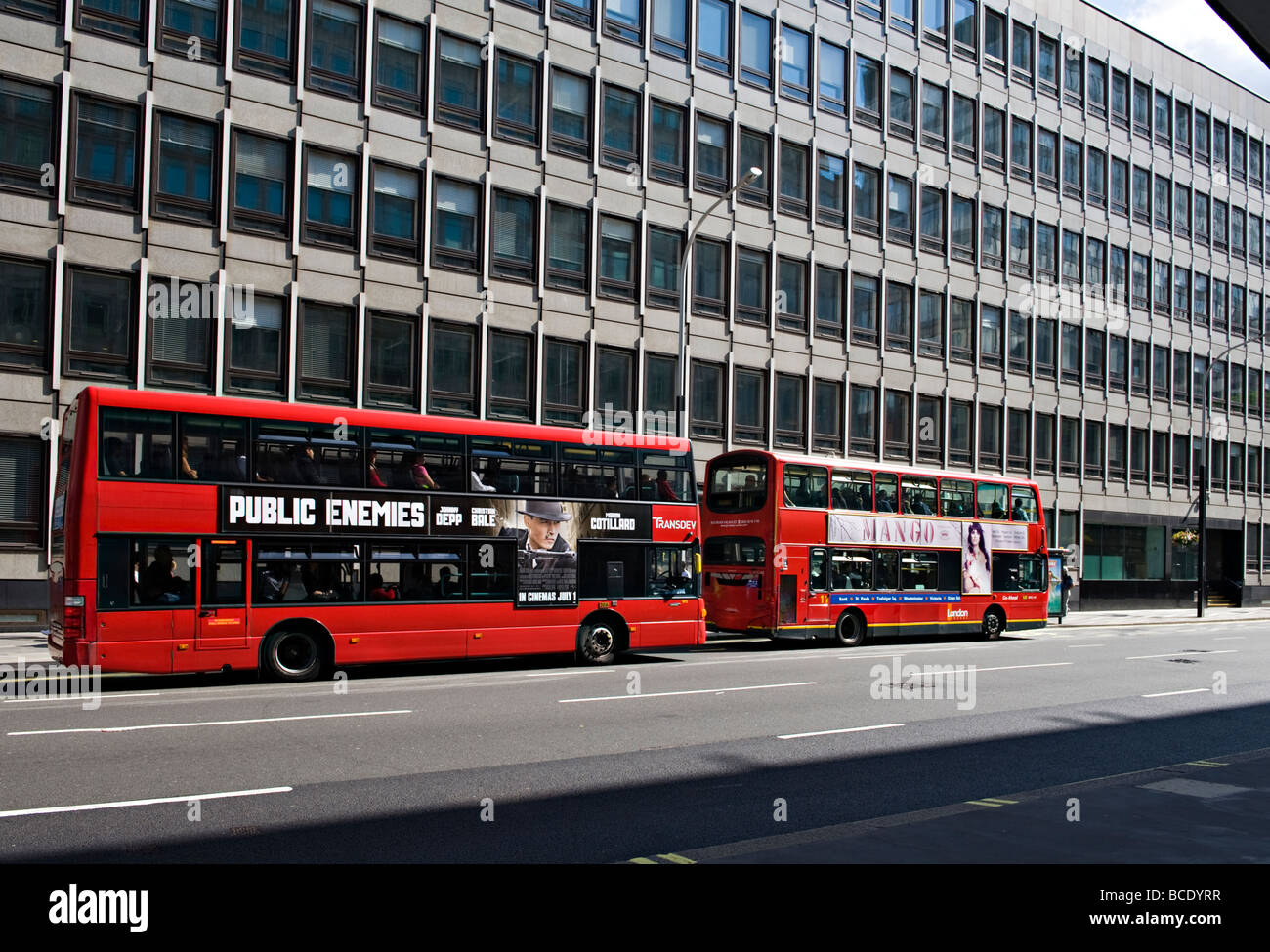 Red London Buses in Victoria Street, London, UK Stock Photo - Alamy