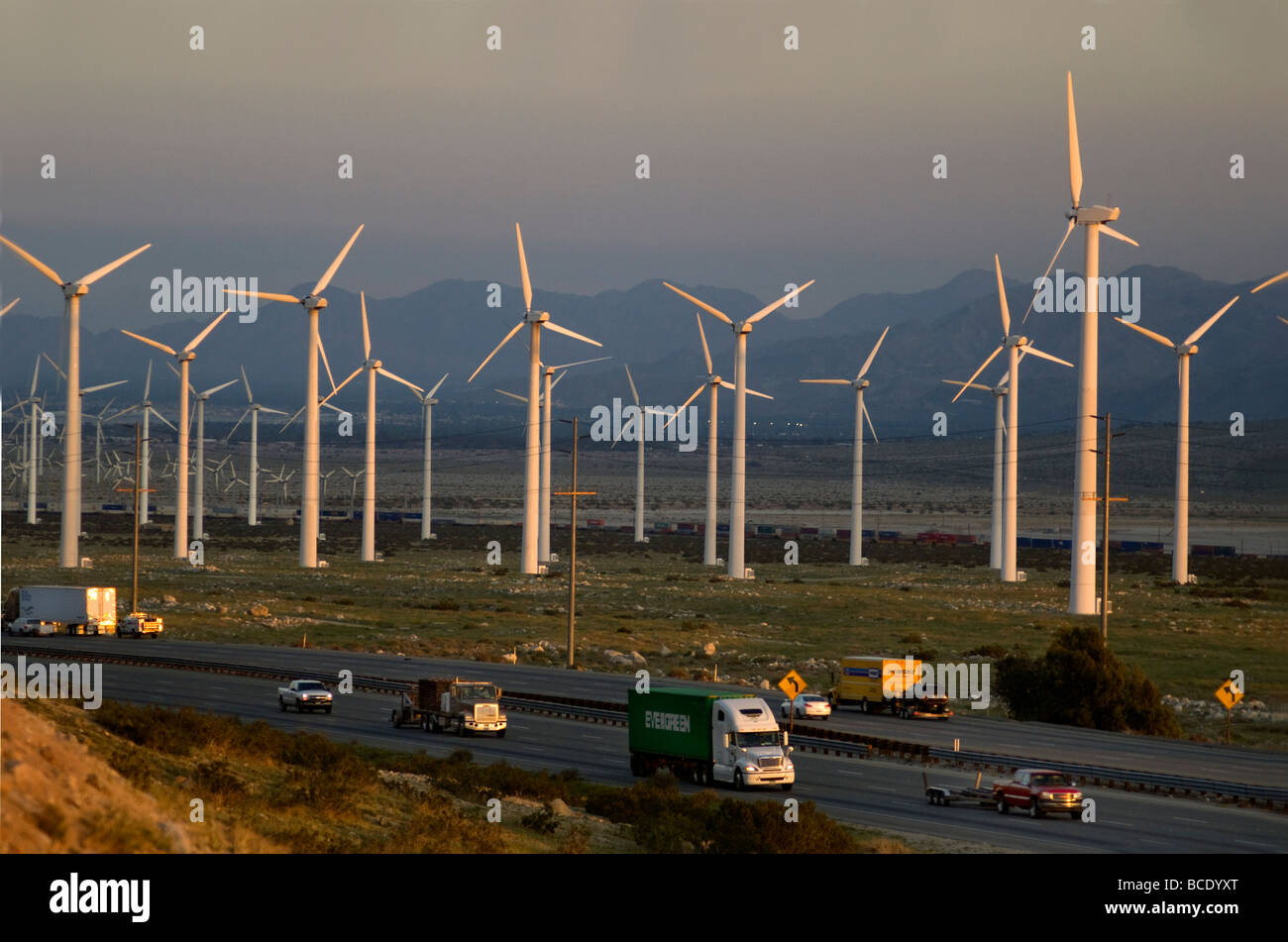 Windmills along highway Stock Photo - Alamy