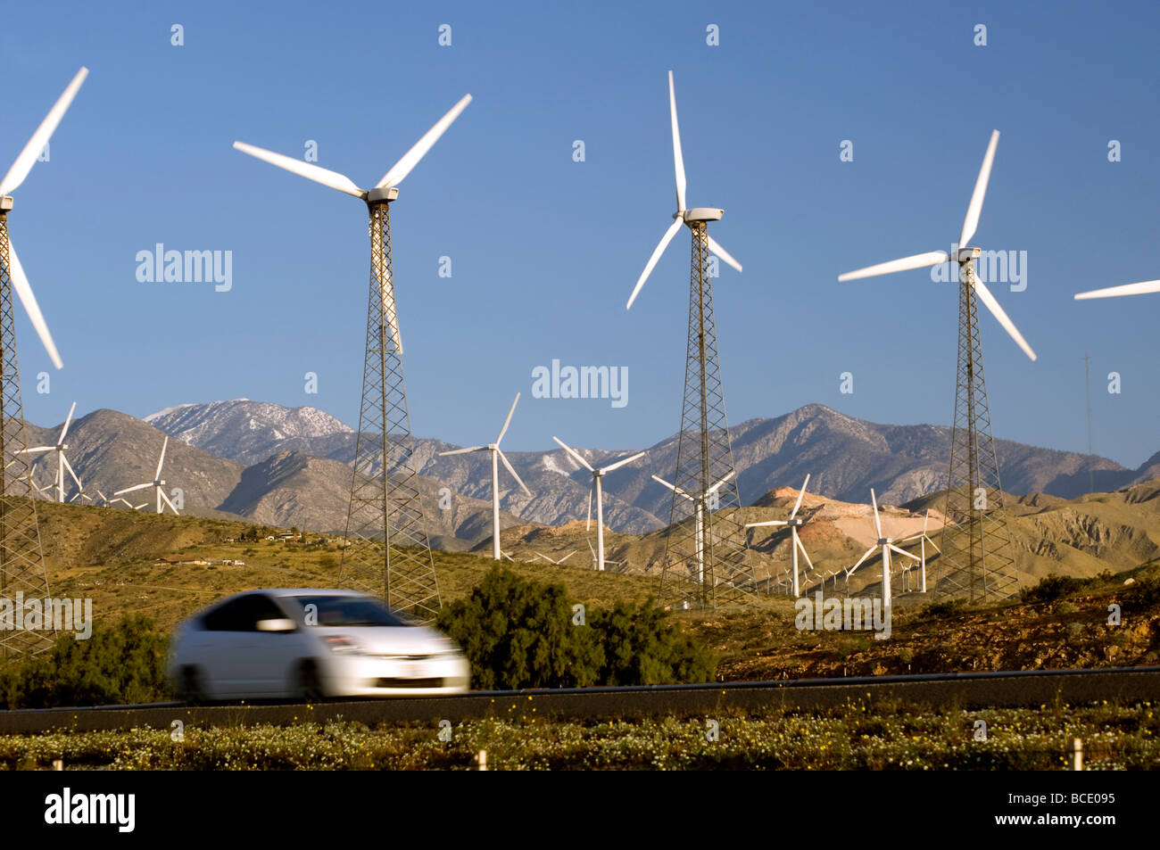 Windmill farm along Highway Stock Photo - Alamy