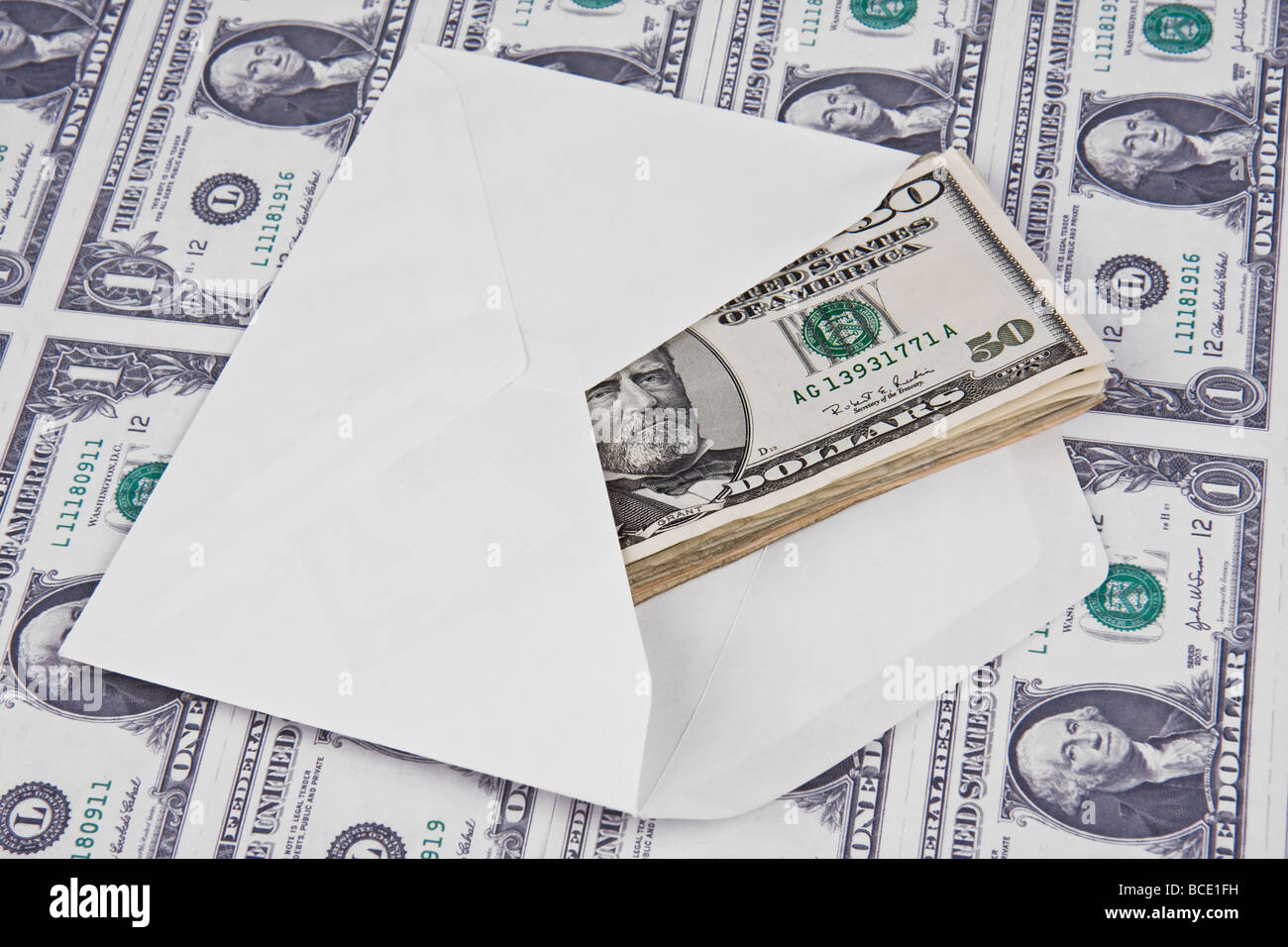 envelope on american money background Stock Photo - Alamy