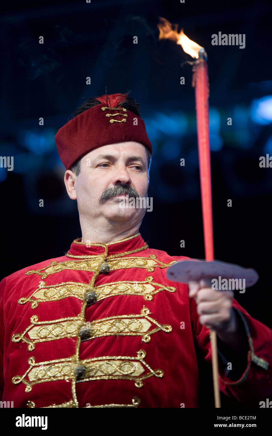 A man in traditional Hungarian folk costume at a cultural festival in ...
