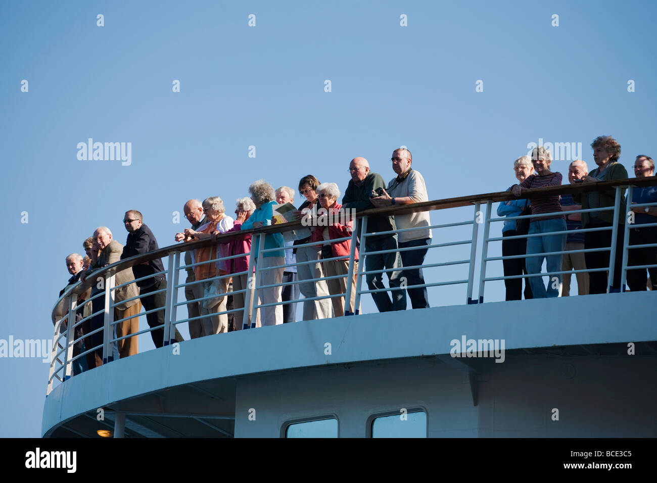 Passengers on stern at a cruise ship Stock Photo - Alamy