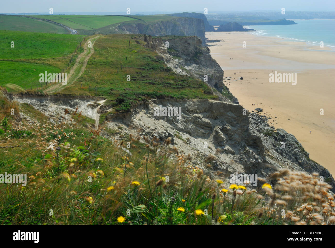 South west Coastal Path passes along cliff tops at watergate Bay Near ...