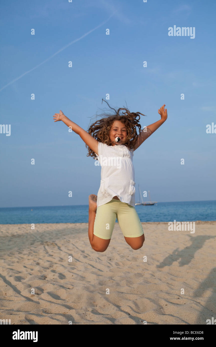Child high jump hi-res stock photography and images - Alamy
