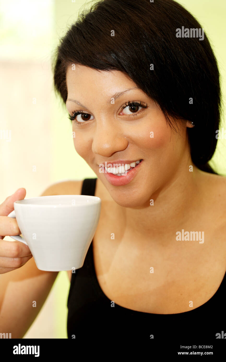 Young Woman Drinking Tea Model Released Stock Photo - Alamy