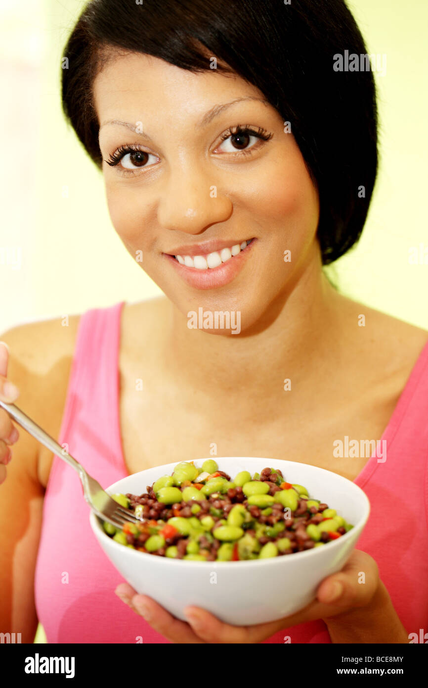 Young Woman Eating Adzuki And Edamame Bean Salad Model Released Stock ...