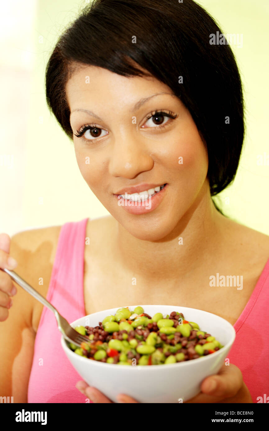 Young Woman Eating Adzuki And Edamame Bean Salad Model Released Stock ...