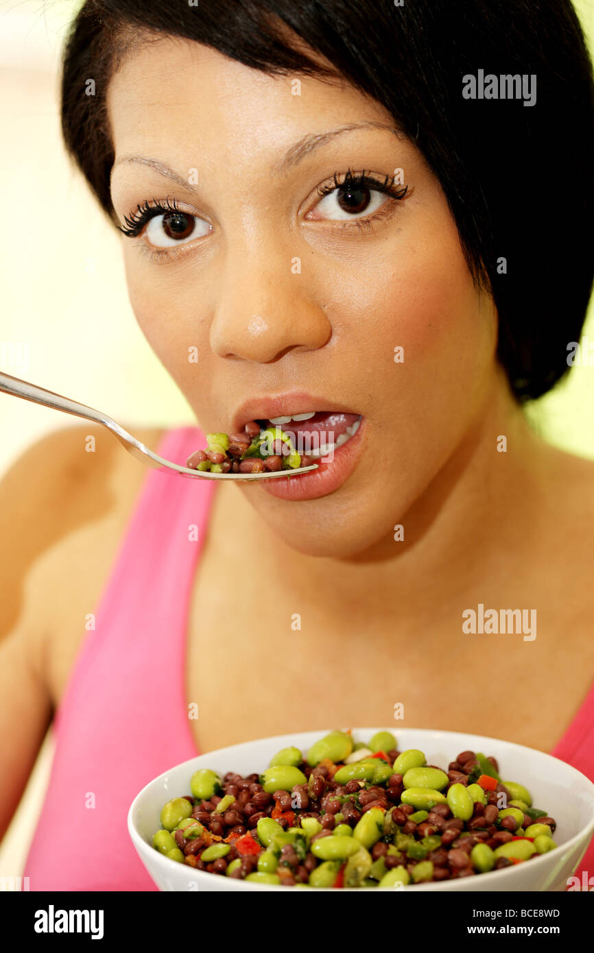 Young Woman Eating Adzuki And Edamame Bean Salad Model Released Stock ...