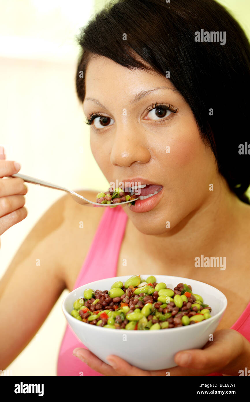 Young Woman Eating Adzuki And Edamame Bean Salad Model Released Stock ...