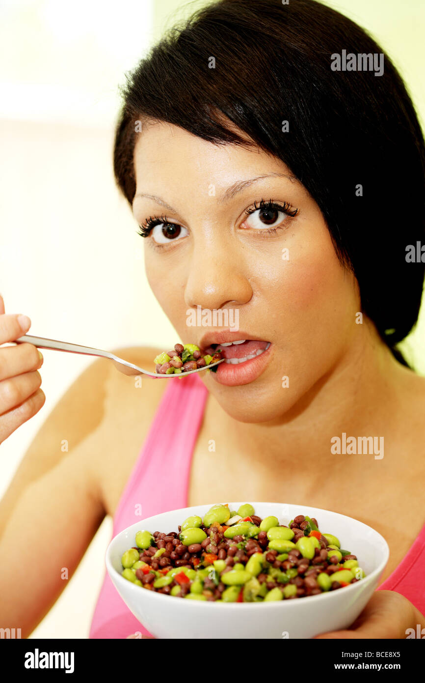 Young Woman Eating Adzuki And Edamame Bean Salad Model Released Stock ...
