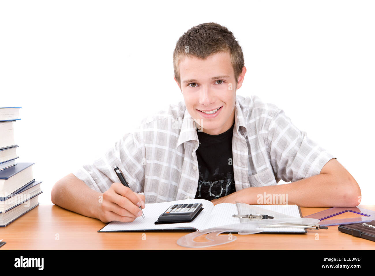 casual teen learning at desk Stock Photo - Alamy