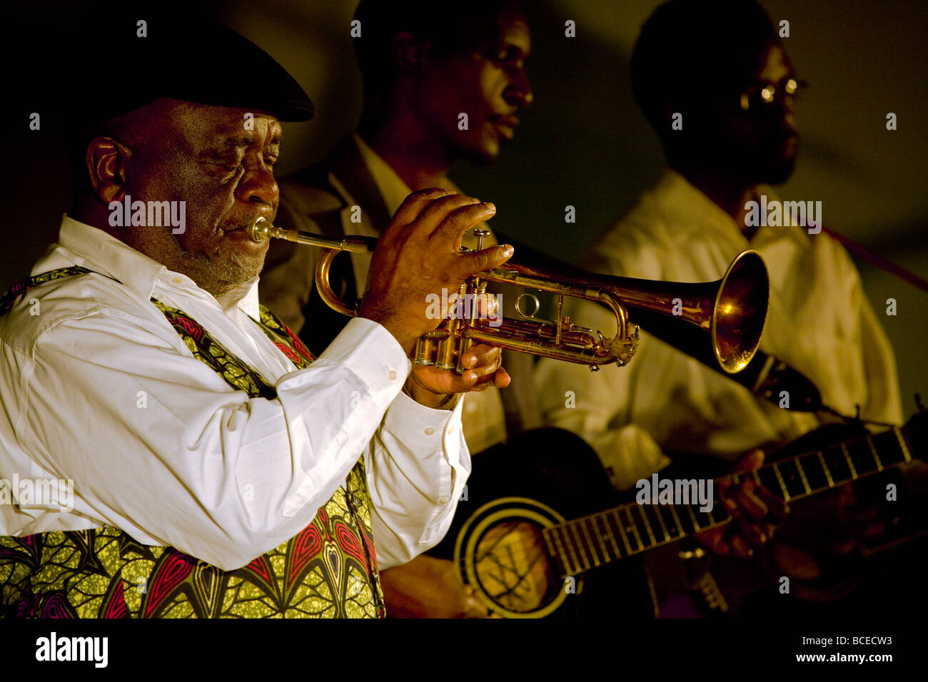 Mozambique, Maputo. A trumpet player performs with his band at Maputo ...