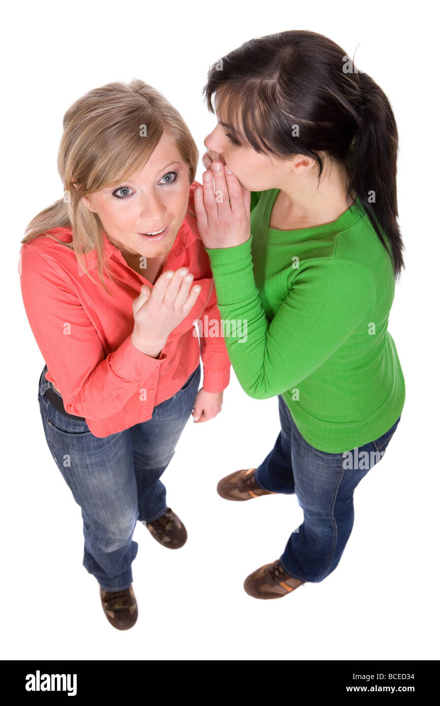 Happy girl friends talking and laughing Stock Photo - Alamy