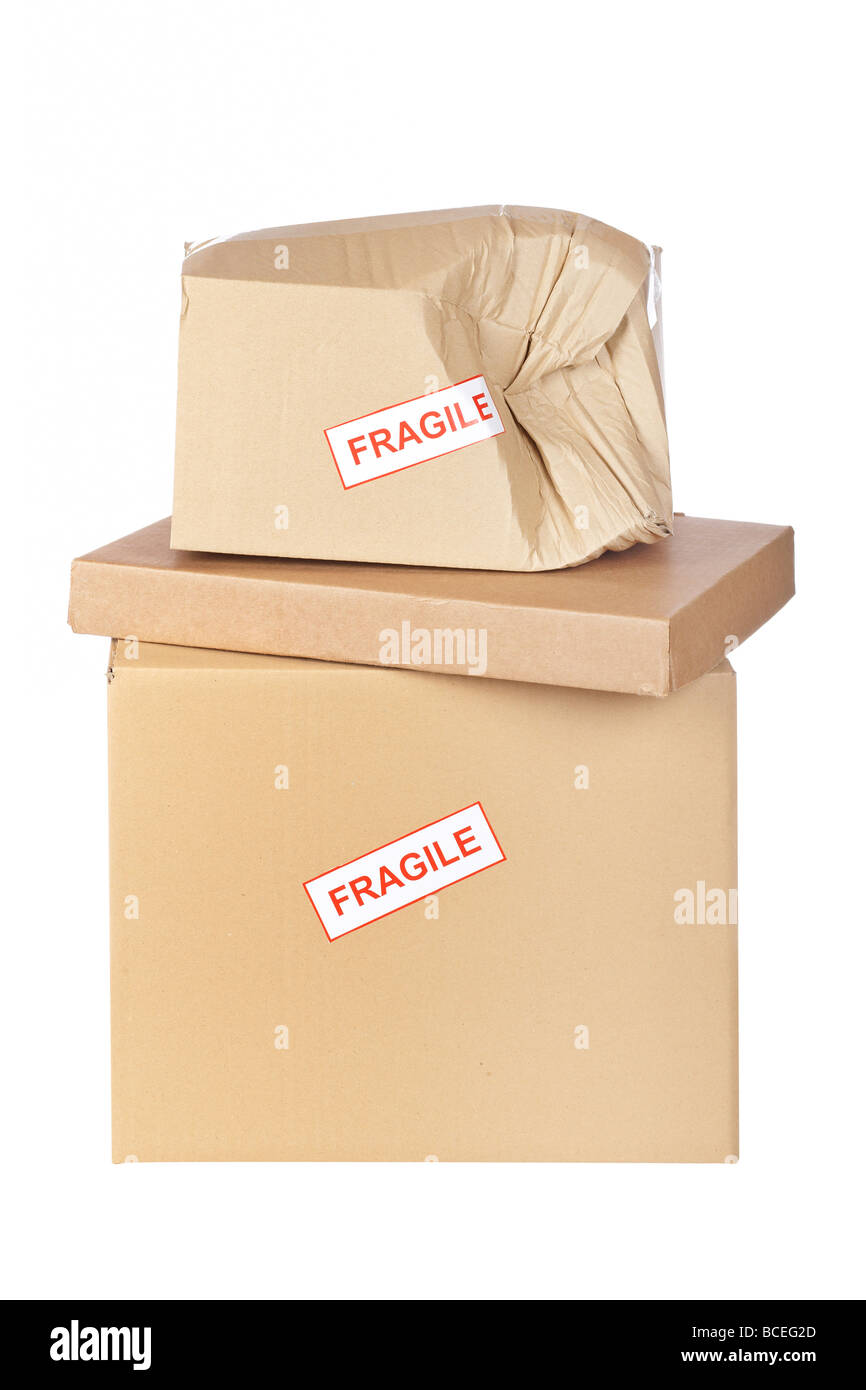 Damaged cardboard box isolated on white background Stock Photo - Alamy