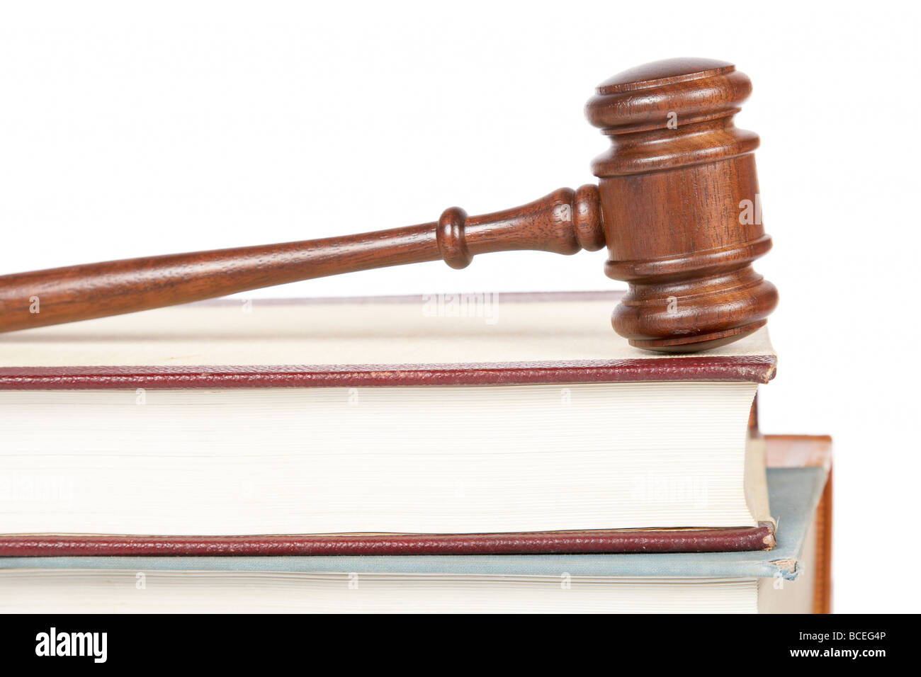 Wooden gavel from the court and law books isolated on white background ...