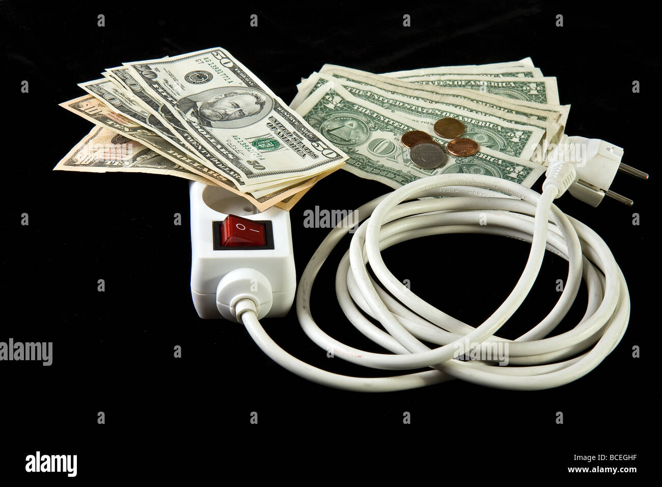 the power plug and money concept energy costs Stock Photo - Alamy