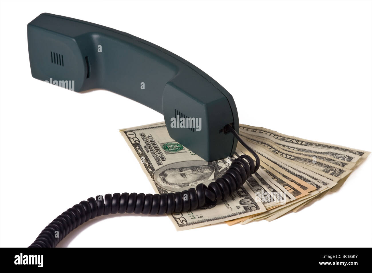 telephone receiver and money on white background Stock Photo - Alamy