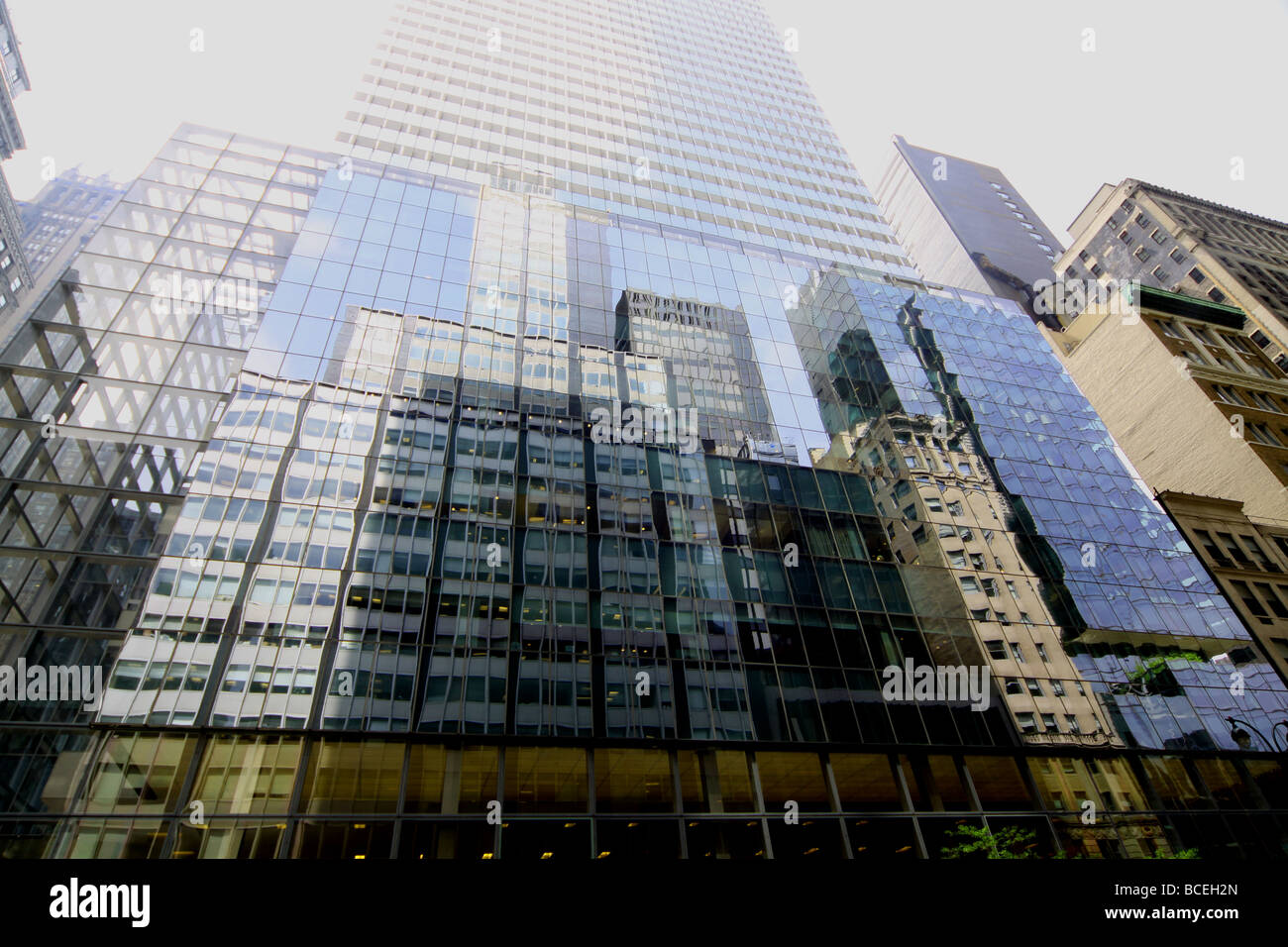 Reflection of opposite buildings in skyscraper, New York Stock Photo ...