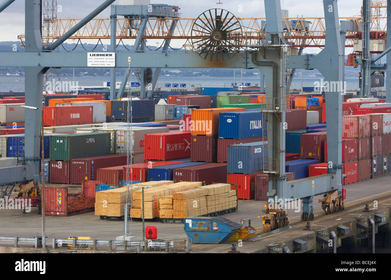 containers and freight goods stacked for export and import in the port ...