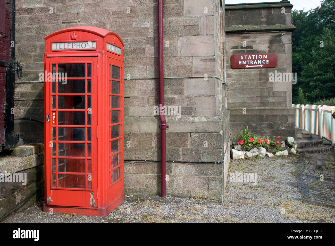 Red telephone box at railway station hi-res stock photography and ...