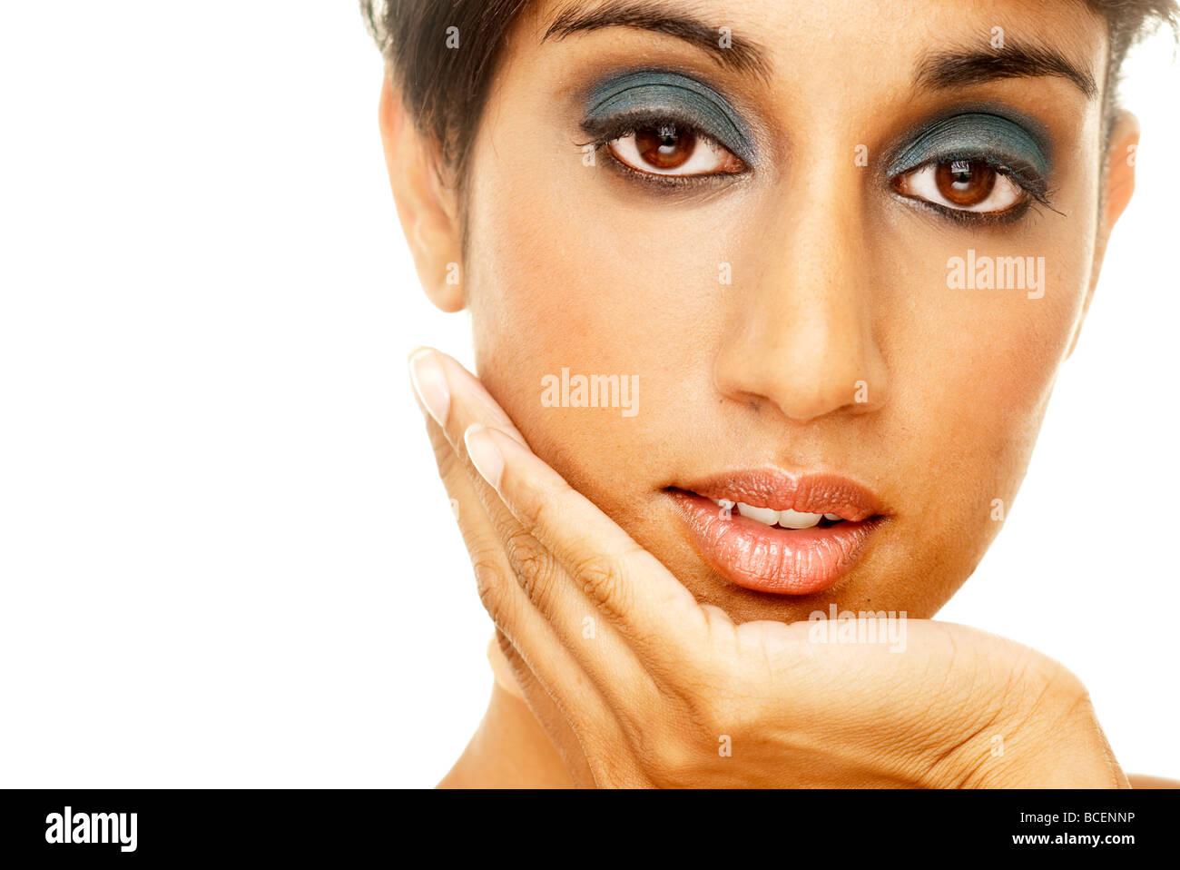 ethnic woman resting her chin on her hand Stock Photo - Alamy