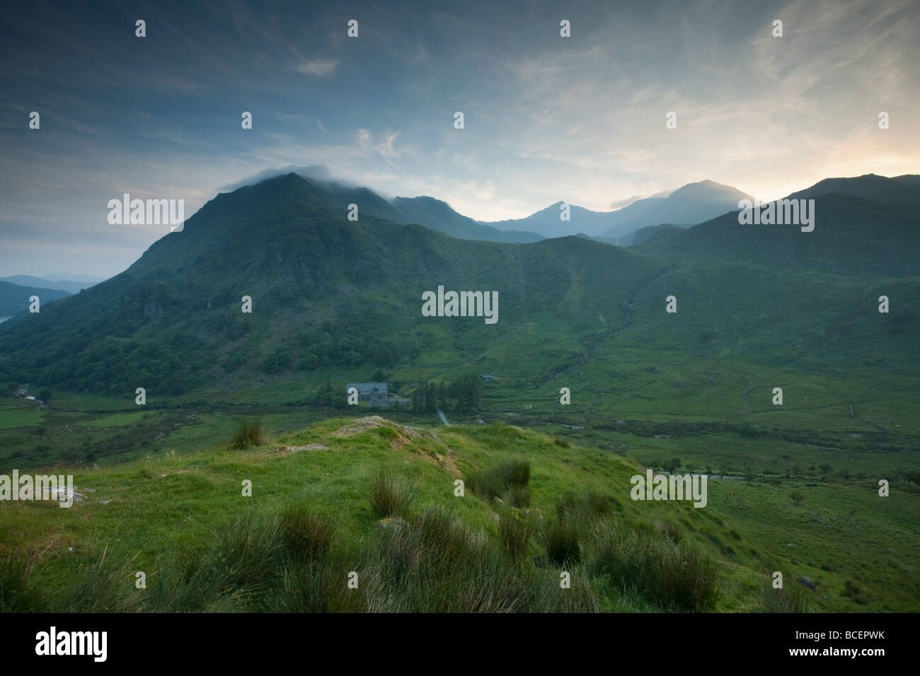 Sunset over the Snowdon mountain range from the Beddgelert road car ...