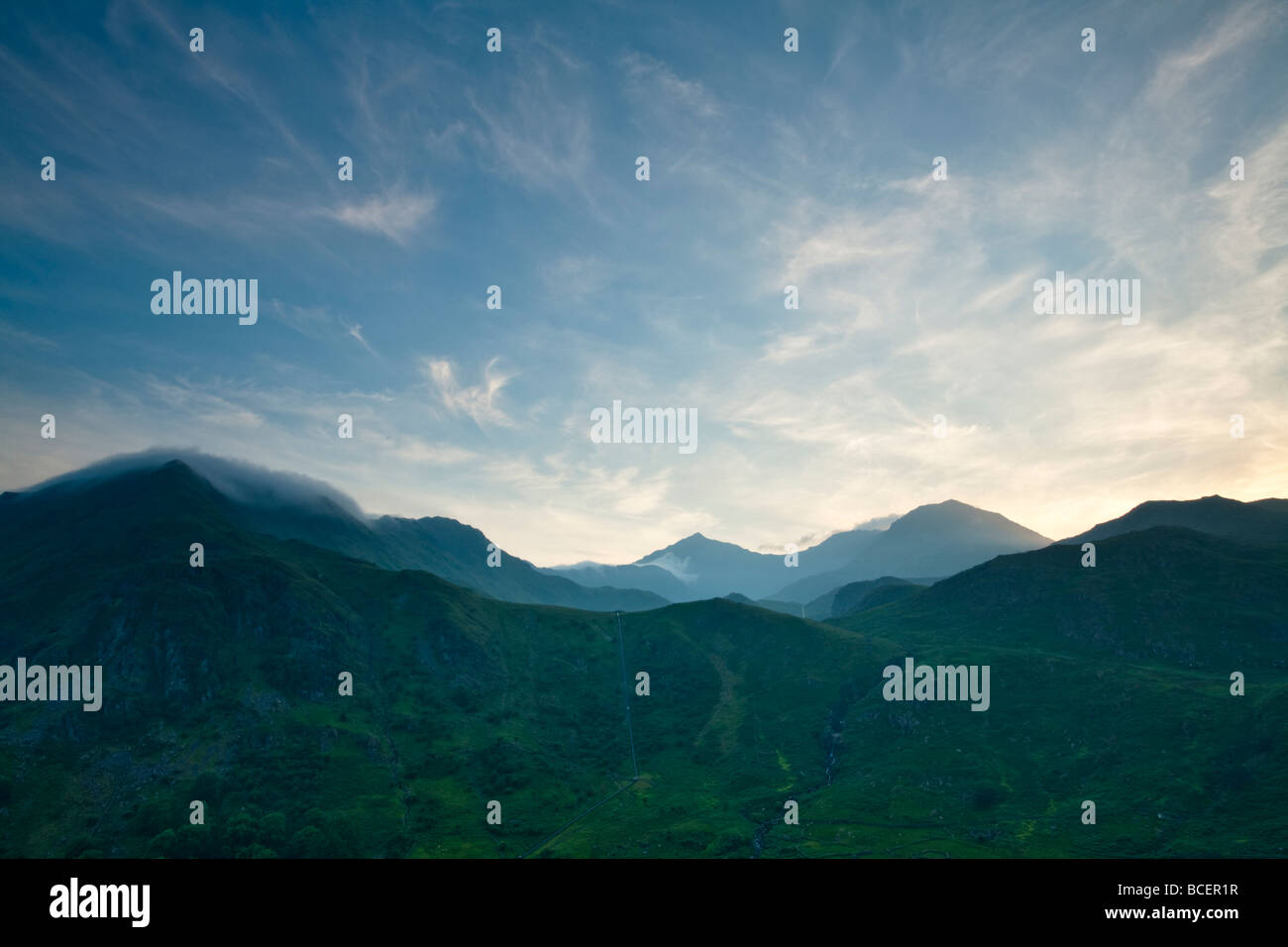Sunset over the Snowdon mountain range from the Beddgelert road car ...