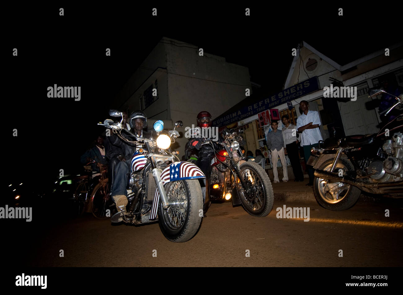 African motorbike gang in downtown Jinja Uganda Stock Photo - Alamy