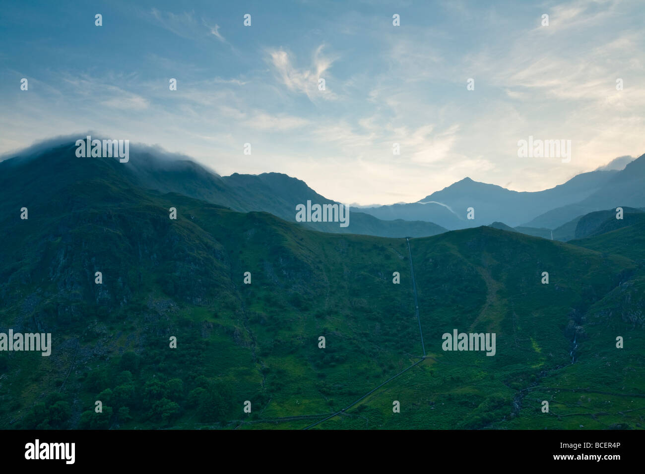 Sunset over the Snowdon mountain range from the Beddgelert road car ...
