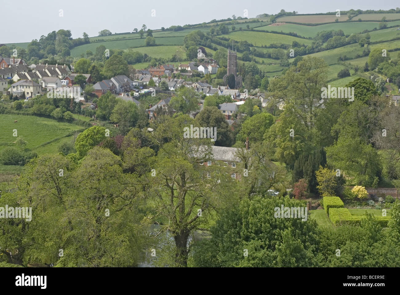 The mid Devon town of Bradninch nestles peacefully on a hillside Stock ...
